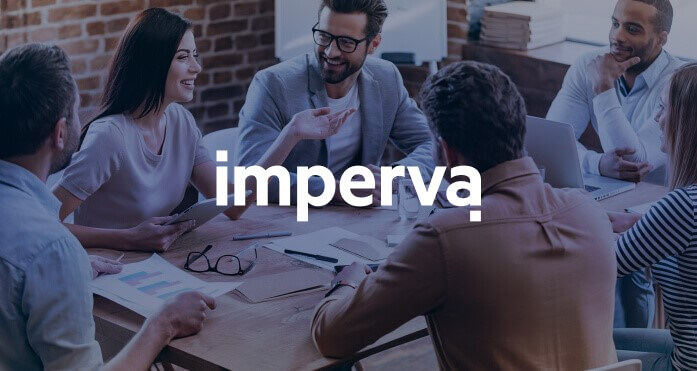 people sitting aqround a table with the imperva logo